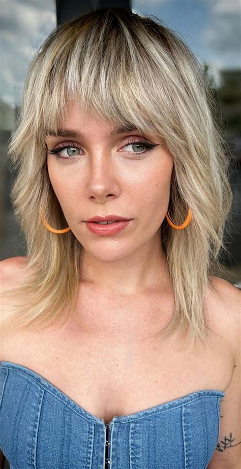 50 Versatile Layered Haircuts Dimensional Blonde Shag With Fringe