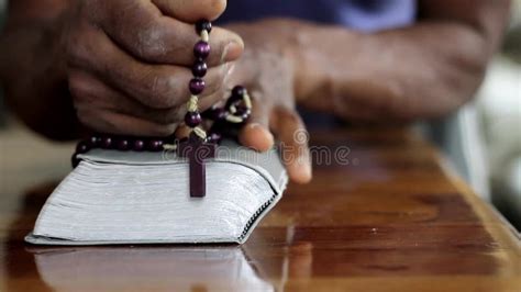 Black Man Praying To God With Bible Caribbean Man Praying With