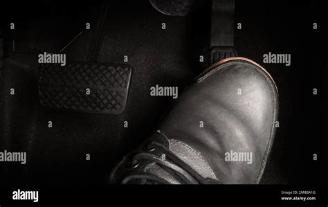 Car Accelerate And Brake Foot Pedal Close Up Foot Press Or Push Foot