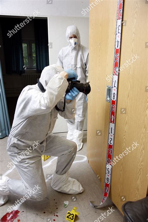 Photographic Securing Forensic Evidence By Officer Editorial Stock