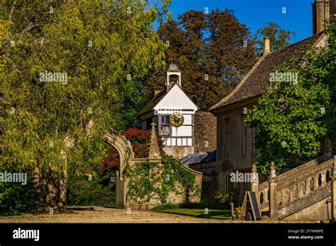 The Tudor Style Architecture Of The Courtyard And Clock Tower At Lacock