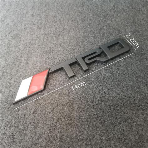 Шильдик на крышку багажника автомобиля Тойота TRD черного цвета ...