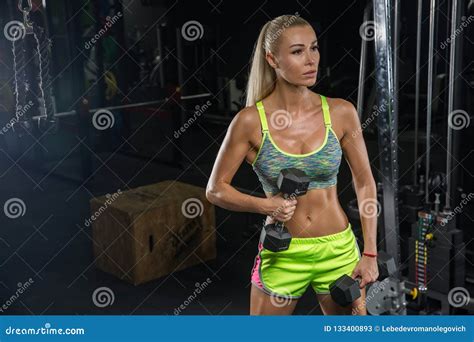Beautiful Young Girl With Perfect Muscles Blonde In The Modern Stock