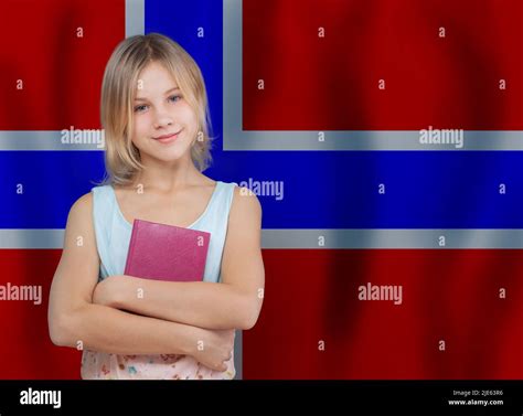Young Beautiful Blonde Girl Against Norwegian Flag Background Stock