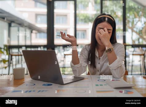 Portrait Of Frustrated Business Woman Have Problem While Sitting At Her