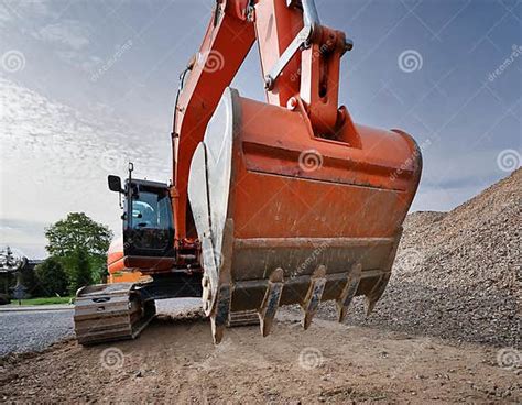 Backhoe Bucket Large Orange Backhoe Parked At A Construction Site Stock Illustration