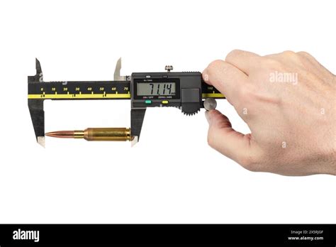 Rifle Bullet Shell Measuring Digital Caliper Measurements Man`s Hand