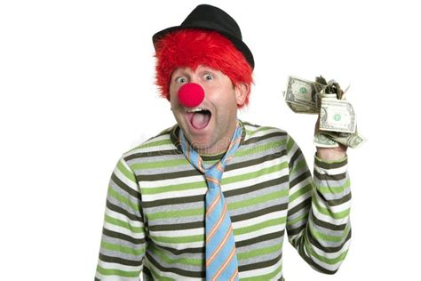 Payaso Con Muchas Notas Del Dólar a Disposición Imagen de archivo Imagen de financiero divisa