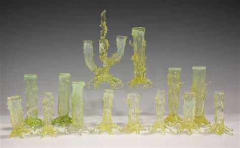 A Group Of John Walsh Walsh Mostly Straw Opalescent Uranium Glass