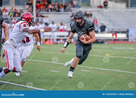 High School Football Player Running With Ball Editorial Image Image