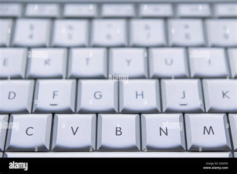 Close Up Of The Centre Of An Apple Mac Pro Laptop Computer Keyboard Stock Photo Alamy