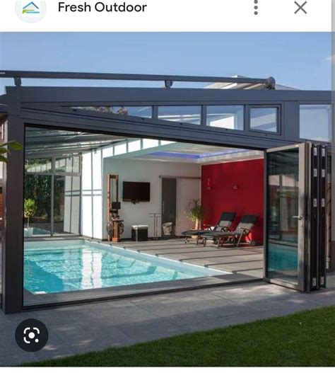 Modern Glass Door Leading To A Swimming Pool
