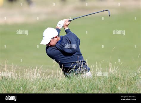 Northern Irelands Rory Mcilroy Chips Out Of A Bunker On The 5th During