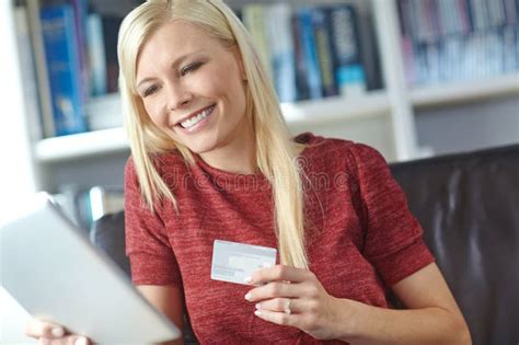 Shopping Made Easy Online An Attractive Young Woman Using Her Digital
