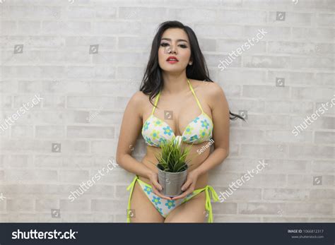 Sexy Concept Sexy Women Holding Tree Stock Photo 1066812317 Shutterstock