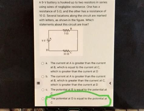 Solved A V Battery Is Hooked Up To Two Resistors In Series Chegg Com