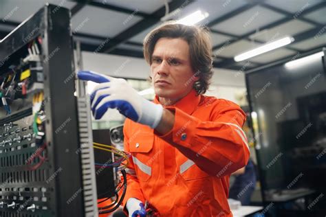 premium photo robotics control engineers solve problems and setting