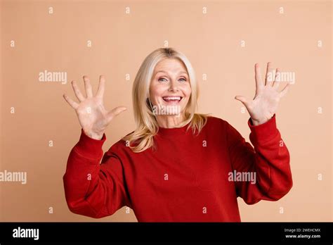 Photo Of Excited Funky Woman Wear Red Sweater Showing Ten Fingers