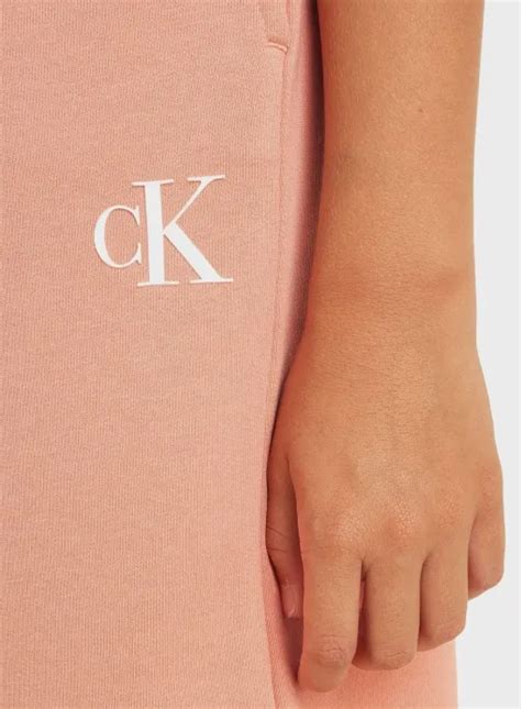 خرید اینترنتی شلوار جین بچه گانه کلوین کلاین صورتی با با 54 تخفیف