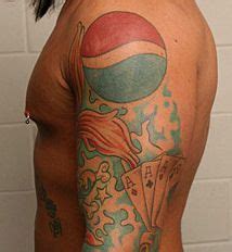 Cm Punks Pepsi Globe Logo On His Left Shoulder When People Inquire