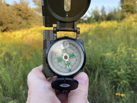 Compass For Orientation On The Terrain During A Hike Stock Image