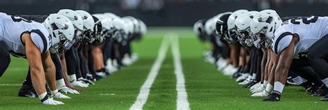 Premium Photo Football Players Eagerly Preparing For Kickoff Anticipating Their Exhilarating Match