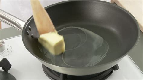 Melting Butter In A Frying Pan Hd Stock Video Clip