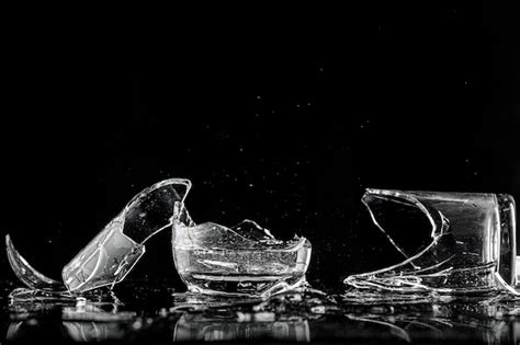 Premium Photo Broken Glasses On A Black Background