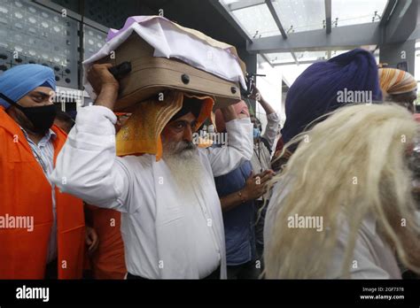 Members Of Sikh Riligion Carry 3 Saroops Of Sri Guru Granth Sahib The