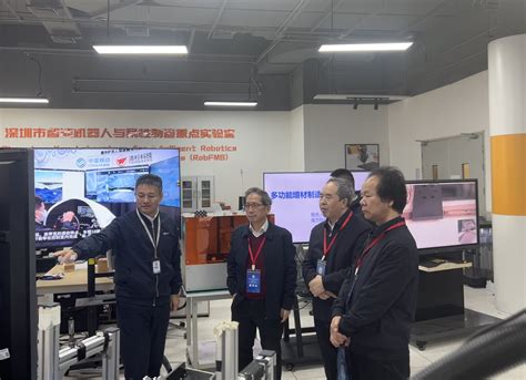 大连理工大学校长贾振元院士，江涌院士参观指导 人体增强机器人实验室