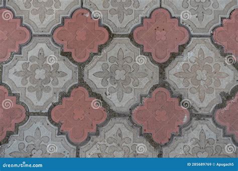 Close View Of Red And Gray Curvy Segmental Concrete Pavement Stock
