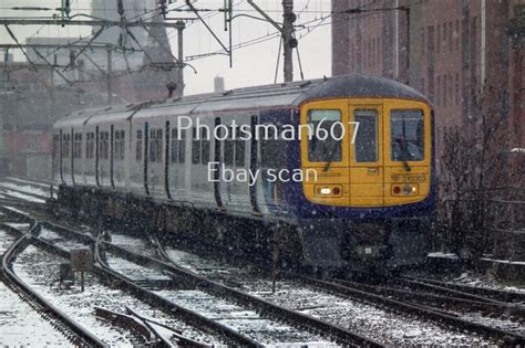 Class 319 319363 4 Car Emu In New Northern In Snow At Manchester
