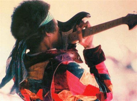 Jimi Hendrix Playing Guitar With His Teeth Vintage News Daily