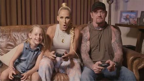 Video The Undertaker Scares Away Shark To Protect Wife Michelle Mccool Wrestletalk