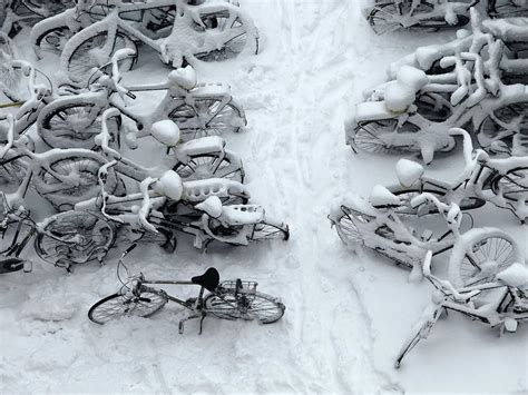 Bicycles In Snow By Ilias Katsouras Jr