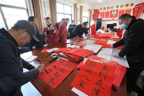 河南淮滨：翰墨飘香迎新春 义写春联送祝福腾讯新闻