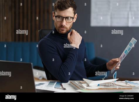 architect working in office with color palette engineer select colors