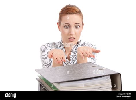 Business Woman In Office Looks At Unbelievable Folder Stack Isolated On