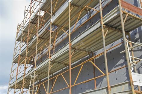 Metal Scaffolding On A Construction Site For The Construction Of Heat