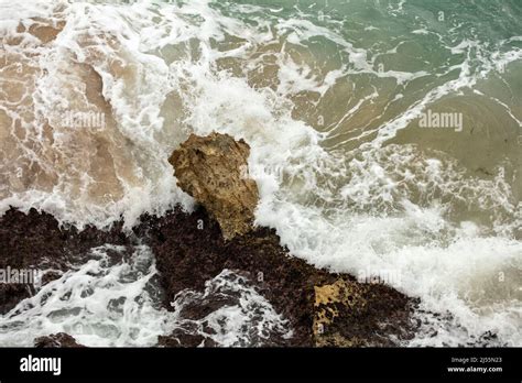 Fascinating Natural Patterns And Abstracts As Sea Swirls Around A Lone