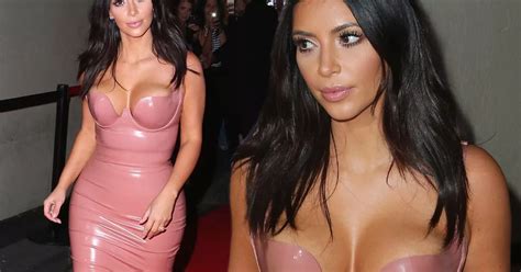 Kim Kardashian Exposes Major Cleavage As She Squeezes Into Eye Popping