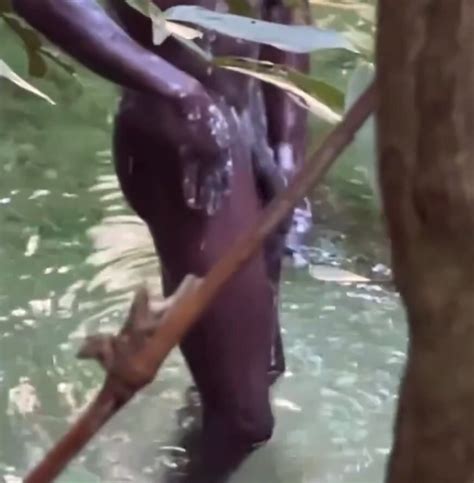 Hung Jamaican Caught Bathing Outside