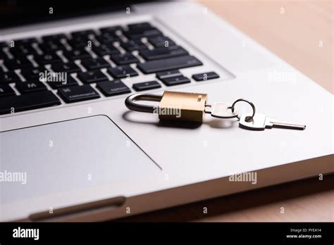 Computer Security And Data Protection Concept Laptop With An Locked Lock And Key On It Stock