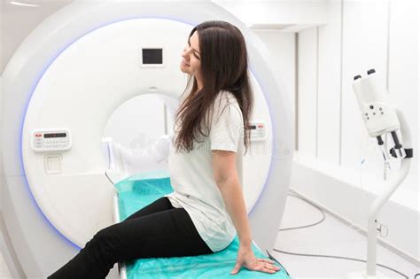 Female Patient Undergoing Mri Magnetic Resonance Imaging In Hospital