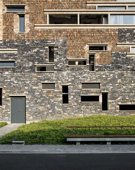 Wave Shaped Roof Of Recycled Tiles Tops Wang Shus Fuyang Cultural Complex