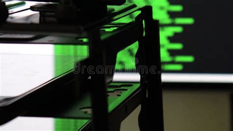Green Computer Software Code Moving On A Black Monitor Reflect On Glass Abstract Computer