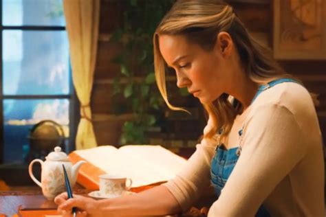 Brie Larson Poses Braless In Thin Top While Flaunting Space Buns