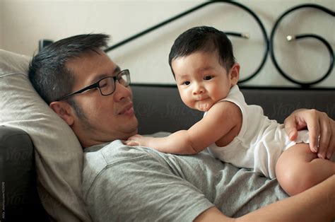 Dad And Young Son Bonding Time By Stocksy Contributor Alita Stocksy