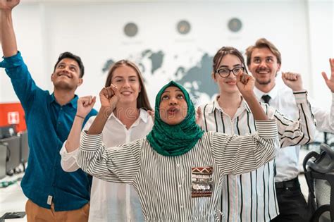 Portrait Of Young Excited Multiethnics Business Team Of Software