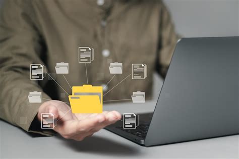 Premium Photo Businessman Using Laptop With Database On Computer To